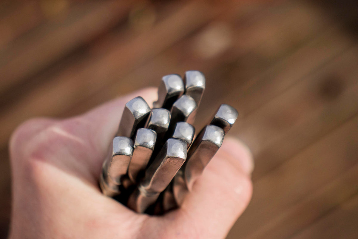 Hand forged steel ninja throwing spikes – Gomer's Workshop